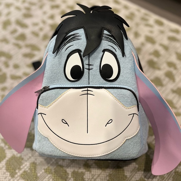 Loungefly | Bags | Loungefly Blue And Pink Eeyore Backpack | Poshmark